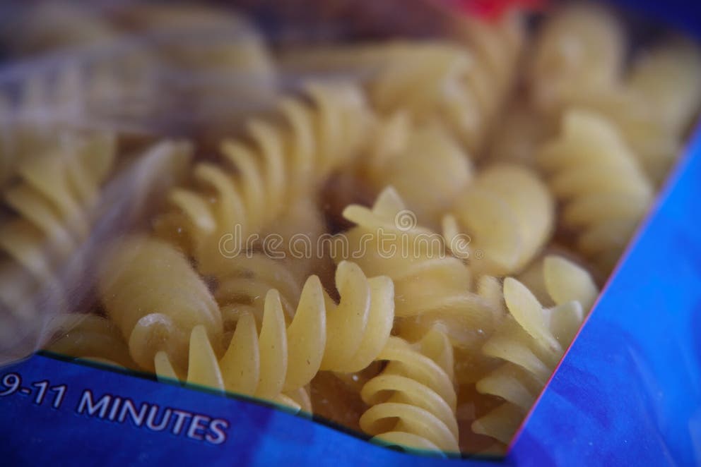 Packaged Pasta. a Close-up View of the Macaroni through the Packaging ...