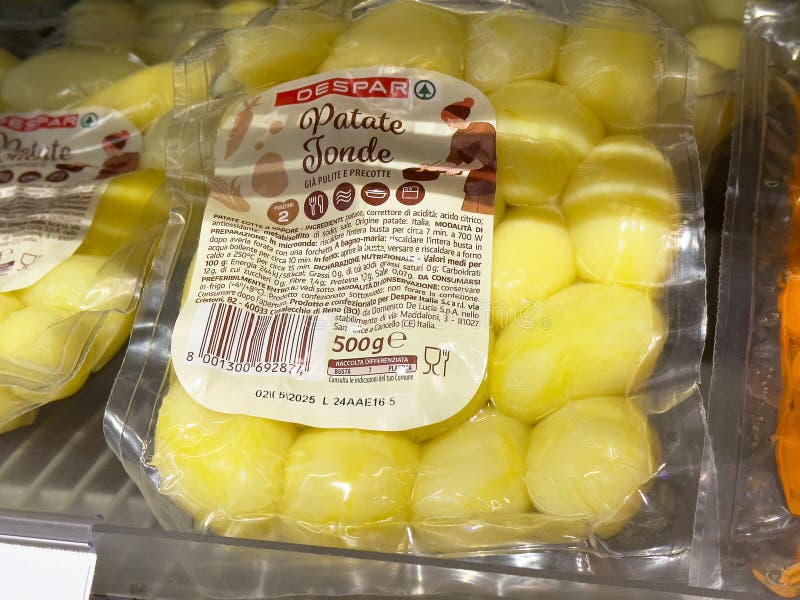 Packaged Peeled Potatoes on Display Shelf in Grocery Store Editorial ...
