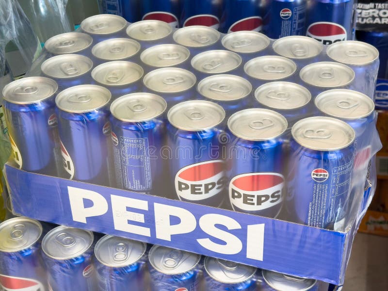 Packaged Pepsi Cans Display in Retail Space Showing Iconic Blue Design ...