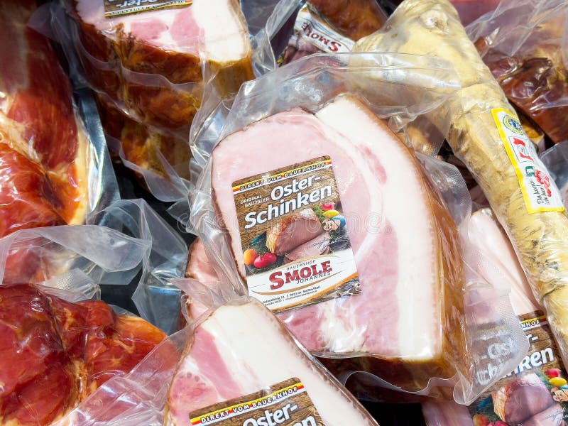 Packaged Smoked Ham and Meat Selection in Vacuum Sealed Bags Display ...