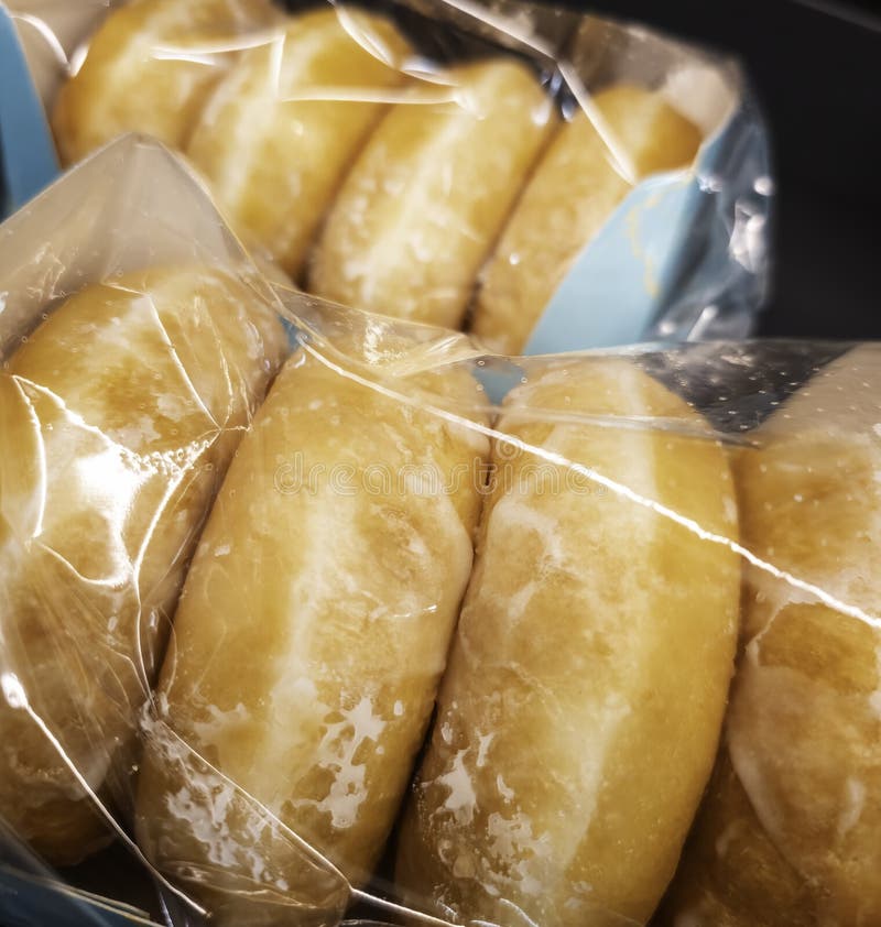 Packaged sugared donuts stock image. Image of cuisine - 369555949