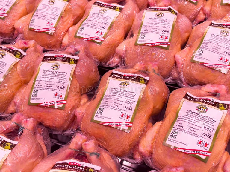Packaged Whole Chickens on Display with Pricing Labels in Grocery Store ...