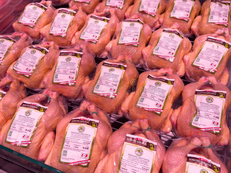 Packaged Whole Chickens Displayed in Supermarket Refrigerated Section ...