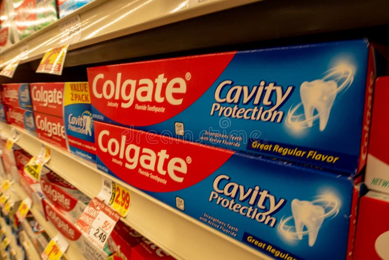 Colgate Toothpaste Being Held by Hand Editorial Stock Image - Image of ...