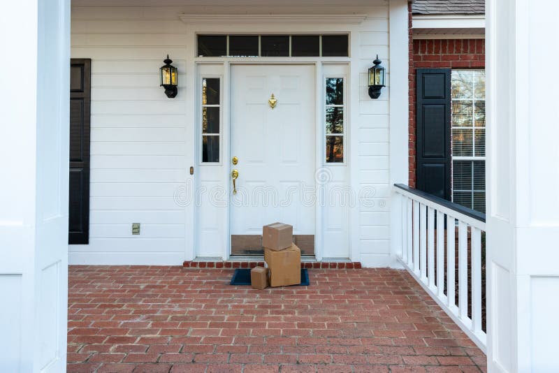 Shipping Boxes on Front Porch of Home Stock Image - Image of boxes ...