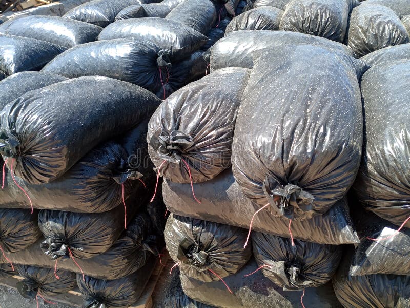 Packages with Rubble and Sand on Construction Site. Building Materials ...
