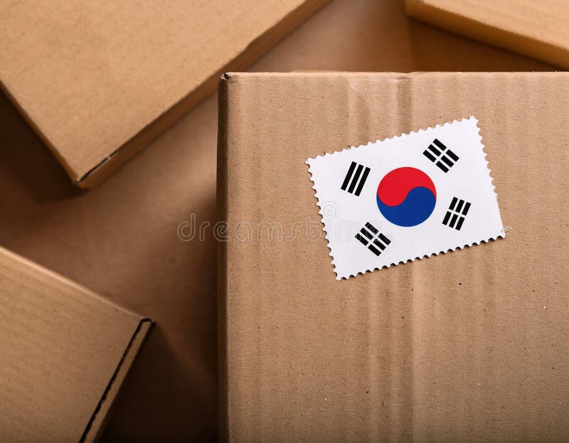 Packages with South Korean Postal Stamp on a Cardboard Box in a ...