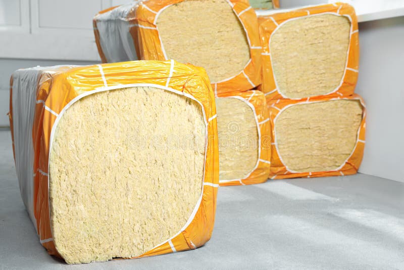 Packages of Thermal Insulation Material in Room. Space for Text Stock ...