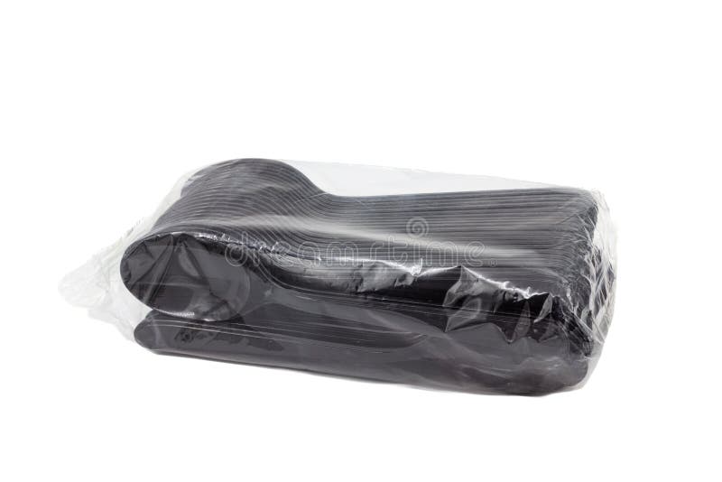 Packaging of Black Plastic Disposable Devices on a White Background ...