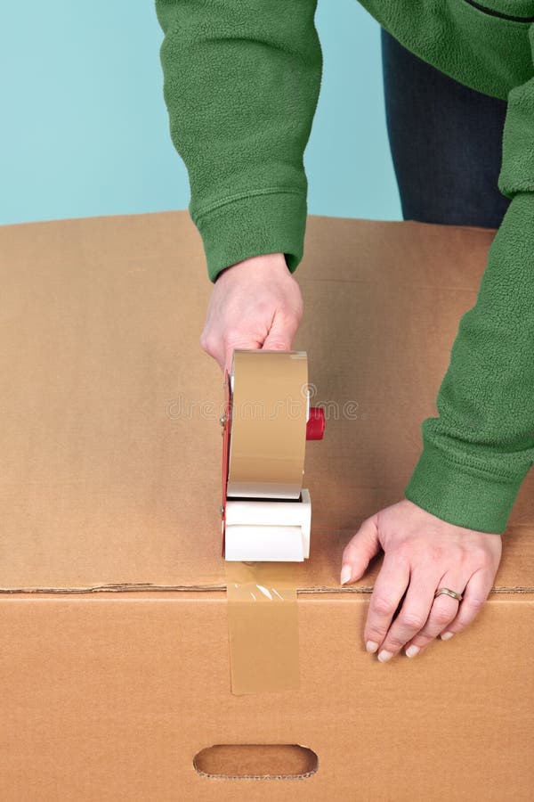 Packaging a box stock image. Image of person, woman, preperation - 21362861