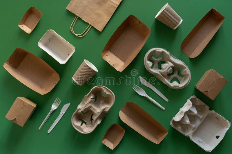 Packaging Concept - Selection of Paper Craft Packaging on Green ...