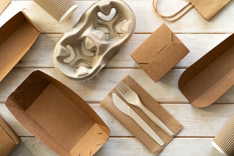 Packaging Concept - Selection of Paper Craft Packaging on White Wood ...