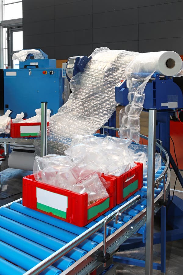 Packaging Cushioning System Stock Photo - Image of roller, machinery ...
