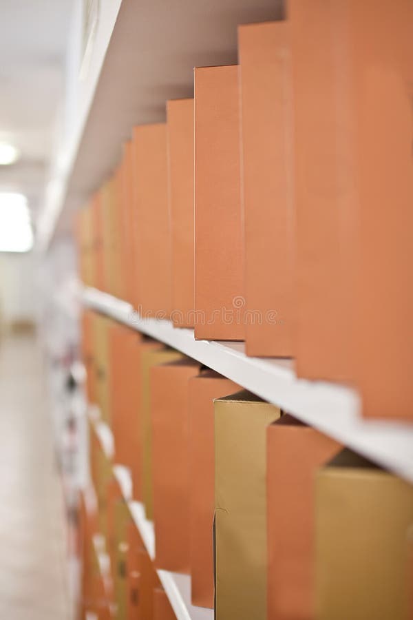Packaging with the Goods on the Shelves in a Shop Stock Photo - Image ...