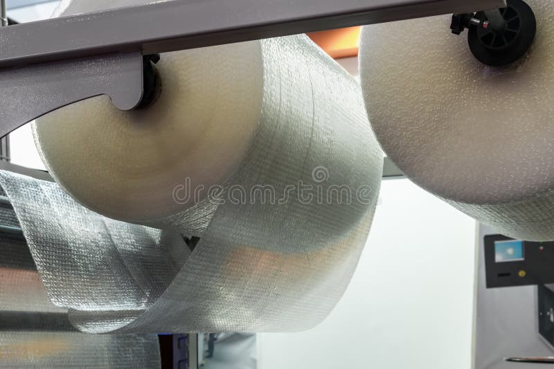 Packaging Machine and Rolls of Bubble Wrap for Packaging Stock Photo ...