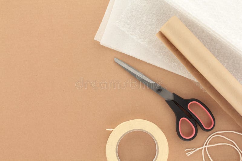 Packaging Materials with Scissors Stock Photo - Image of protection ...