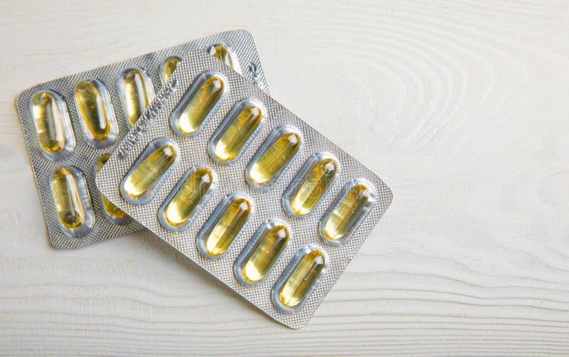 Packaging of Omega 3 Capsules on a White Textural Background. Stock ...