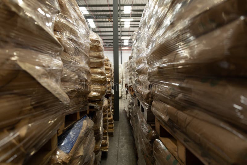 Packed Goods on a Rack in Warehouse Stock Photo - Image of plastic ...