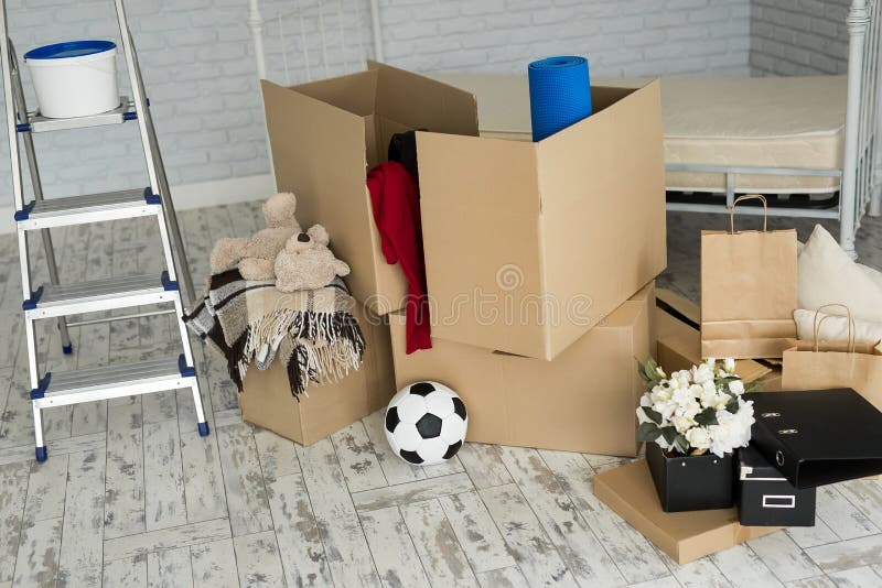 Packed Household Stuff for Moving into New House. Stock Image - Image ...