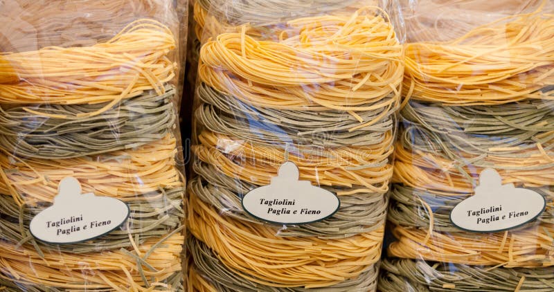 Packed Italian Yellow, Spinach Pasta Tagliatelle Stock Image - Image of ...