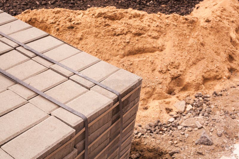 Packed Large and Long New Concrete Blocks for Curbs, Lying on the ...