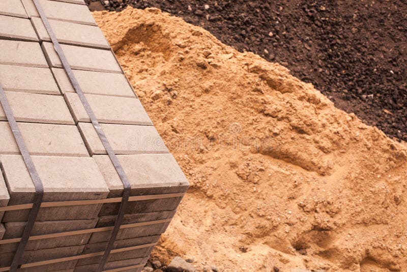 Packed Large and Long New Concrete Blocks for Curbs, Lying on the ...