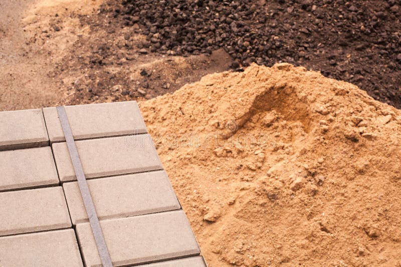 Packed Large and Long New Concrete Blocks for Curbs, Lying on the ...