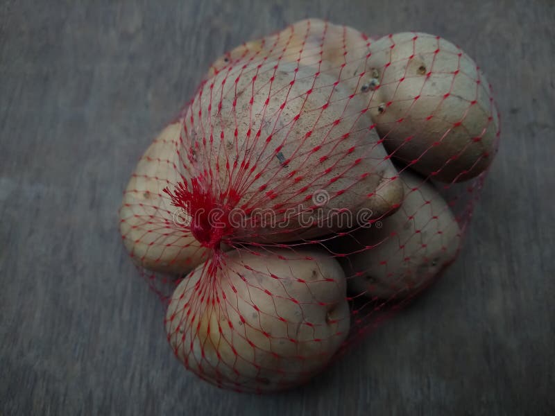 Packed potatoes on a table stock photo. Image of plant - 191602350