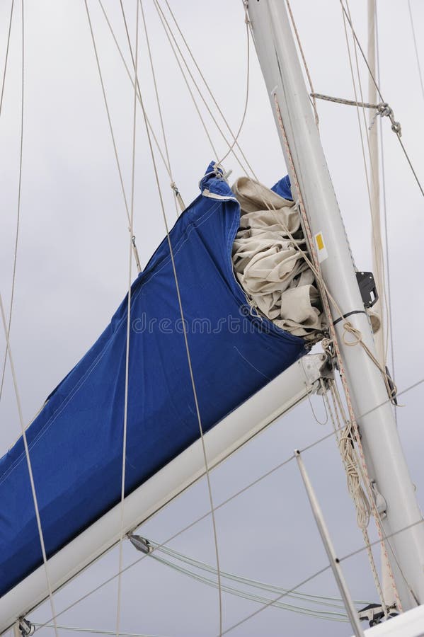 Packed sail stock photo. Image of spar, boom, sail, white - 11561294
