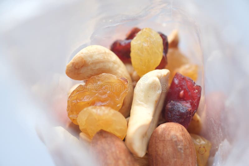 Packet of Mixed Nuts on Table Stock Image - Image of plastic, bowl ...