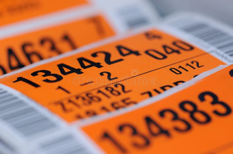 Orange Paper Barcode Label on Packaging Side for Shipping ...