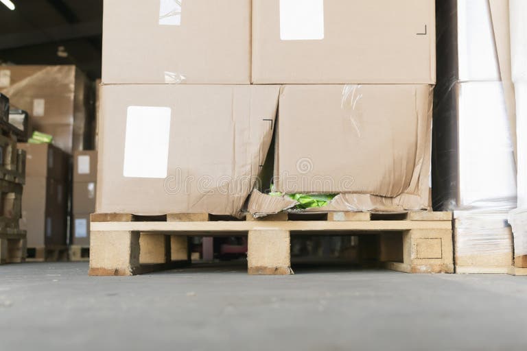 The Packing Box on the Pallet with the Goods is Torn Stock Photo ...