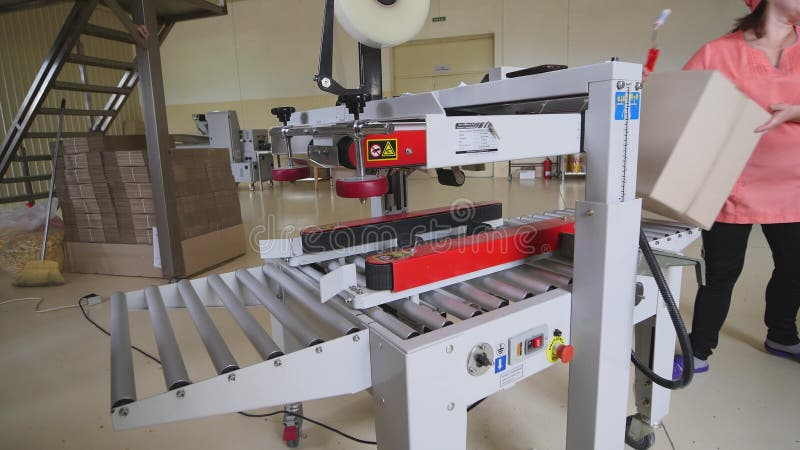 Packing Boxes Along Conveyor Stock Image - Image of factory, high ...