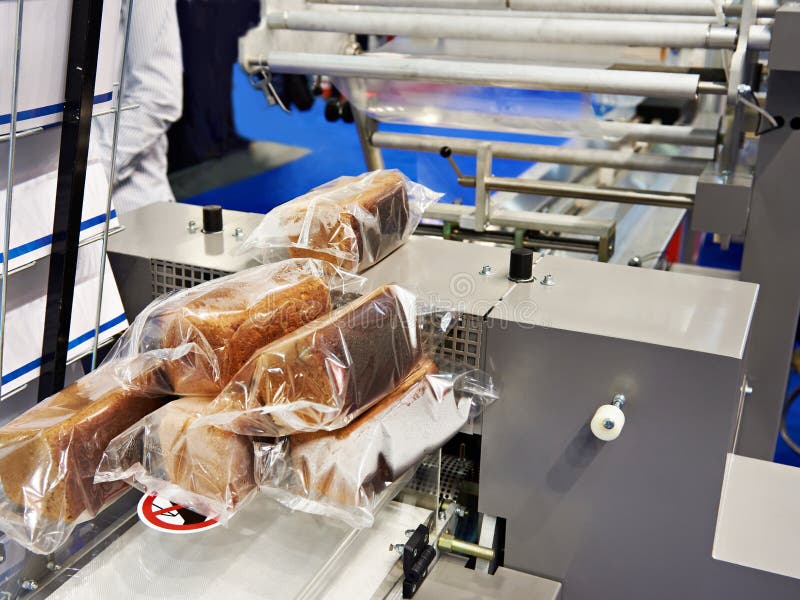 Packing of Bread at Factory Stock Photo - Image of process, fresh ...