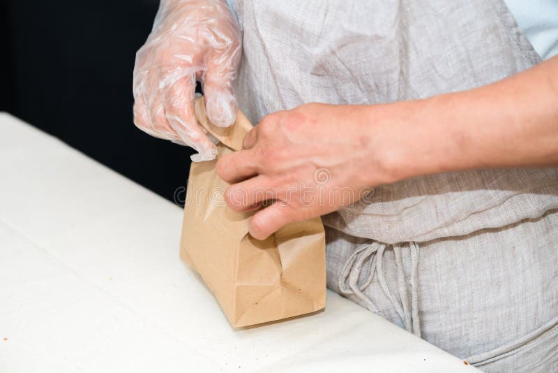 Packing Bread in To Paper Bag Stock Photo - Image of bread, crunchy ...
