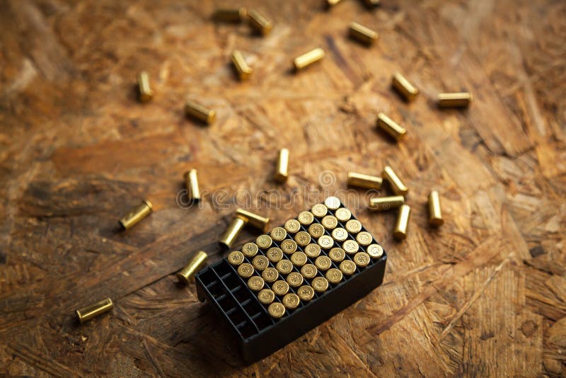 Packing of Bullets for a Rifle and Empty Bullets Stock Photo - Image of ...
