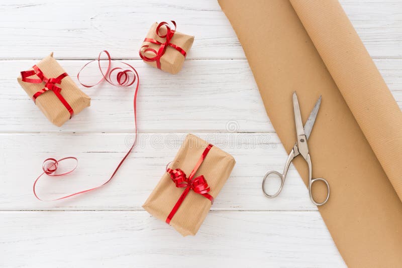 Packing Christmas presents stock photo. Image of ribbon - 80543112