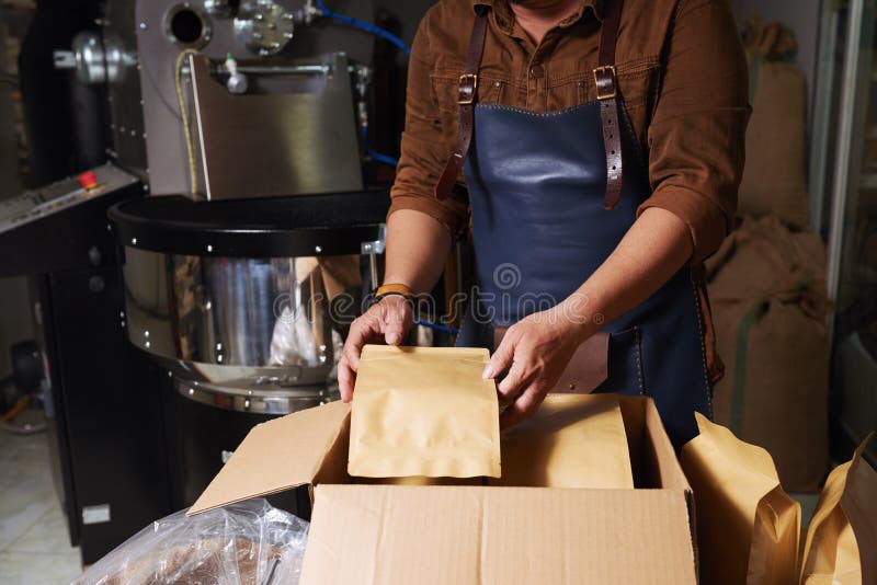 Packing coffee stock photo. Image of coffee, cropped - 116067358