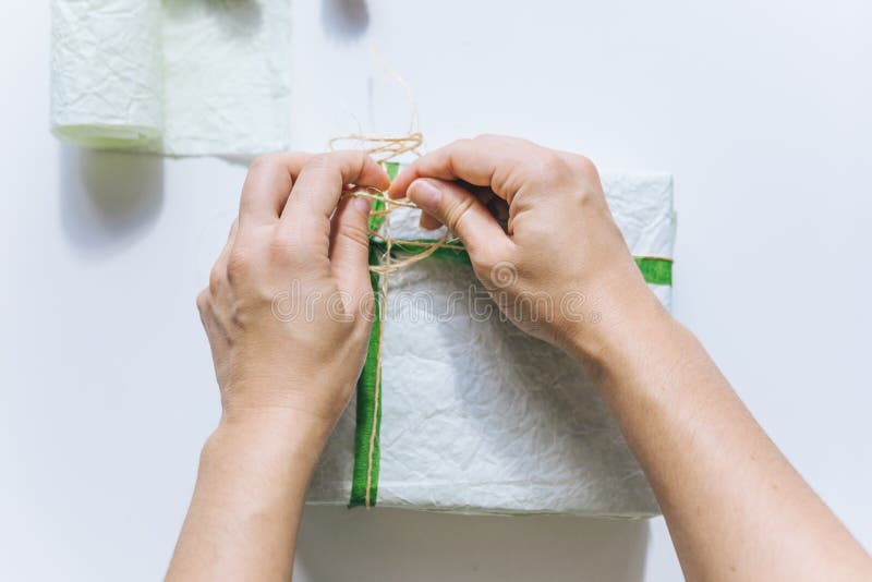 Packing Gift Box with Wrapping Paper Stock Photo - Image of overhead ...