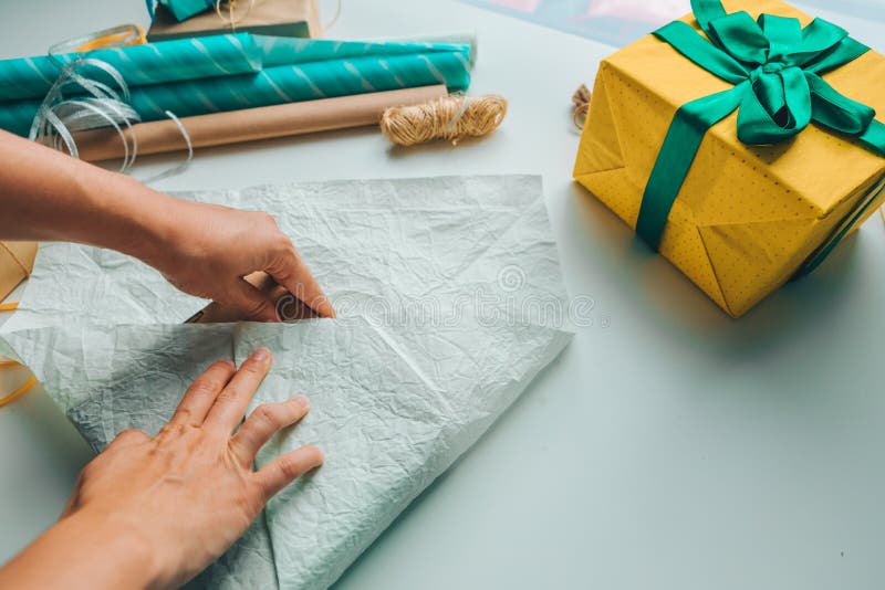 Packing Gift Box with Wrapping Paper Stock Photo - Image of rope ...