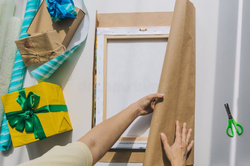 Packing Gift Box with Wrapping Paper Stock Photo - Image of merchandise ...