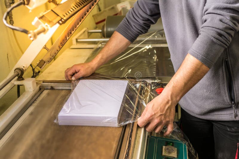 Packing Paper with Plastic Machine Stock Image - Image of equipment ...