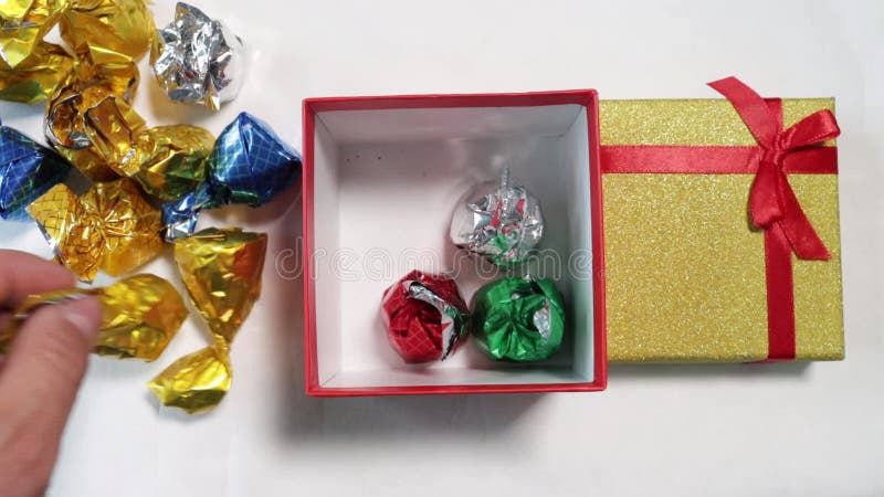 Packing Sweets in a Gift Box. Stock Footage - Video of temptation ...