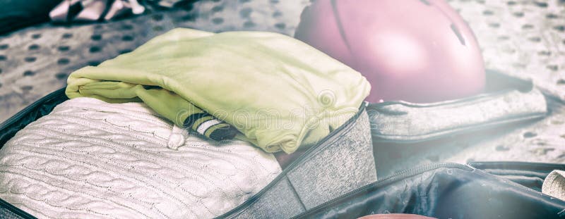 Packing for a Trip. Suitcase with Clothes on the Bed Stock Image ...