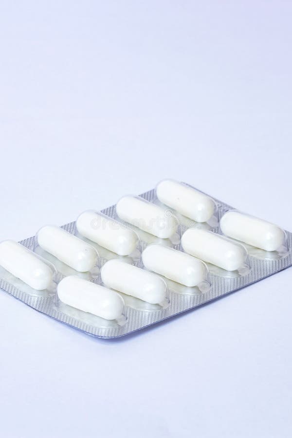 Packing of White Tablets on Blue Background Stock Photo - Image of ...