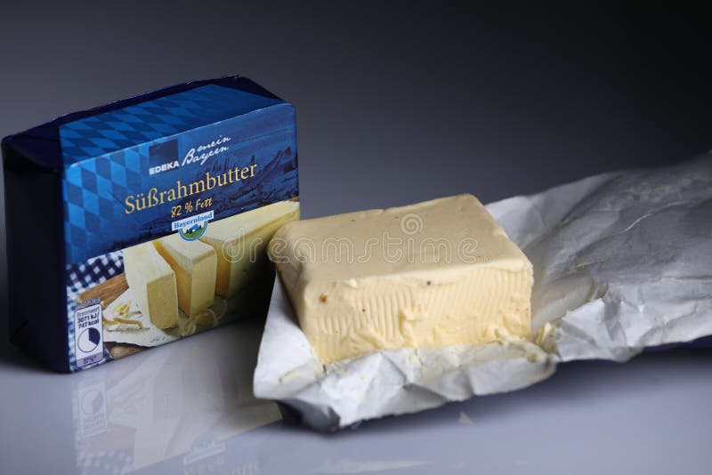 Pack of Butter in a Butter Dish Stock Photo - Image of package, yellow ...