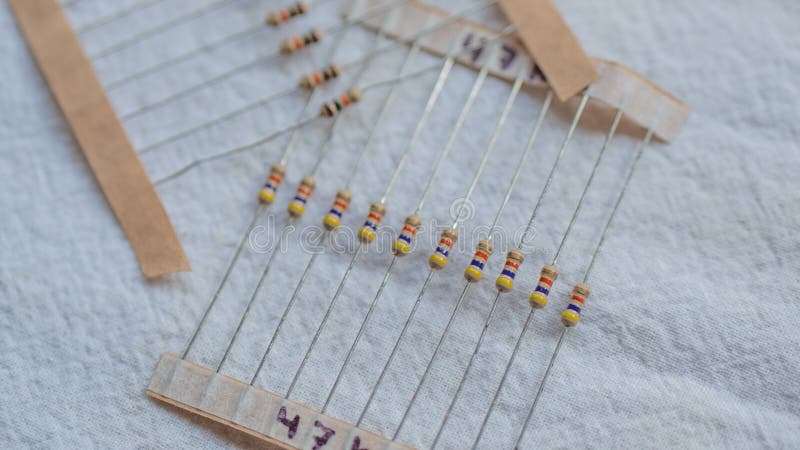 Packs of Electrical Resistor Components Against a White Background ...