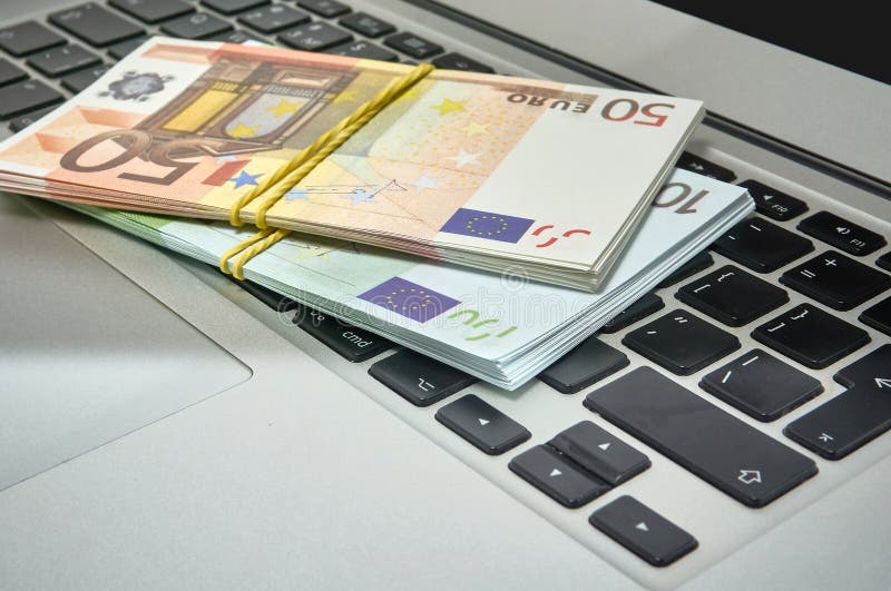 Packs of 100 and 50 Euro Bills Lying on the Computer Keyboard Stock ...