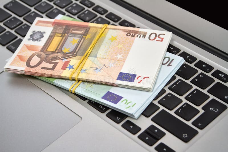 Packs of 100 and 50 Euro Bills Lying on the Computer Keyboard Stock ...