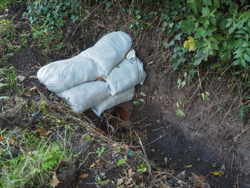 Packs of Sand in Ditch Bridge Stock Image - Image of packs, pack: 60565607
